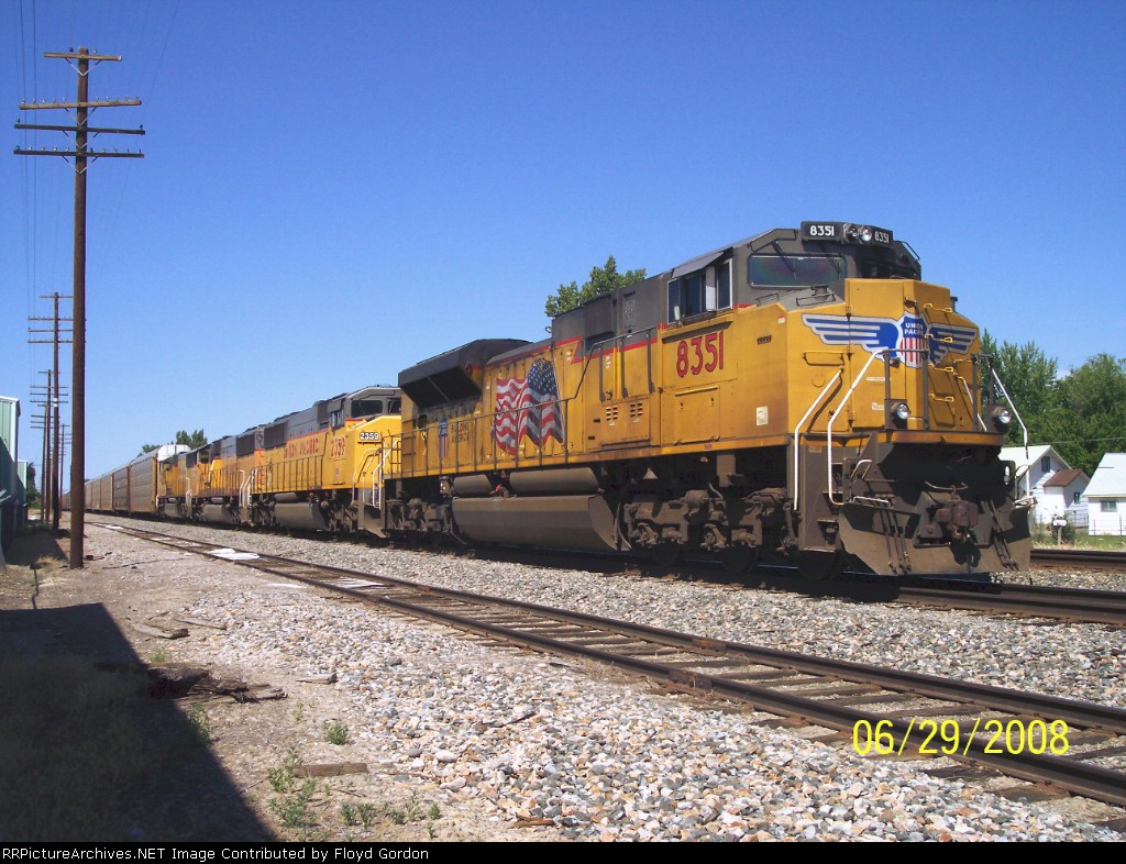 UP 8351 leads a four unit eastbound auto rack train